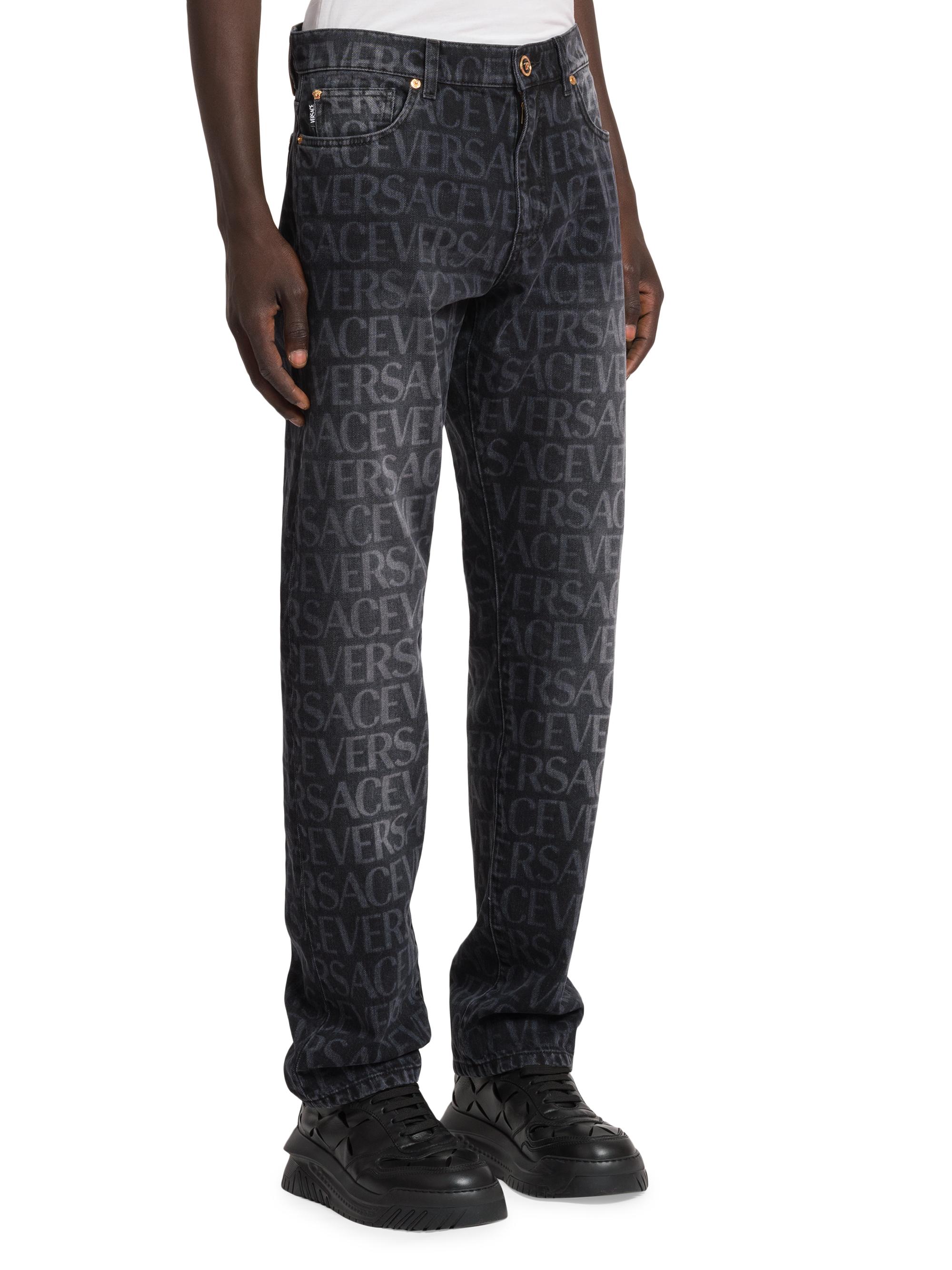 Shop Versace Gradient Logo Jeans | Saks Fifth Avenue