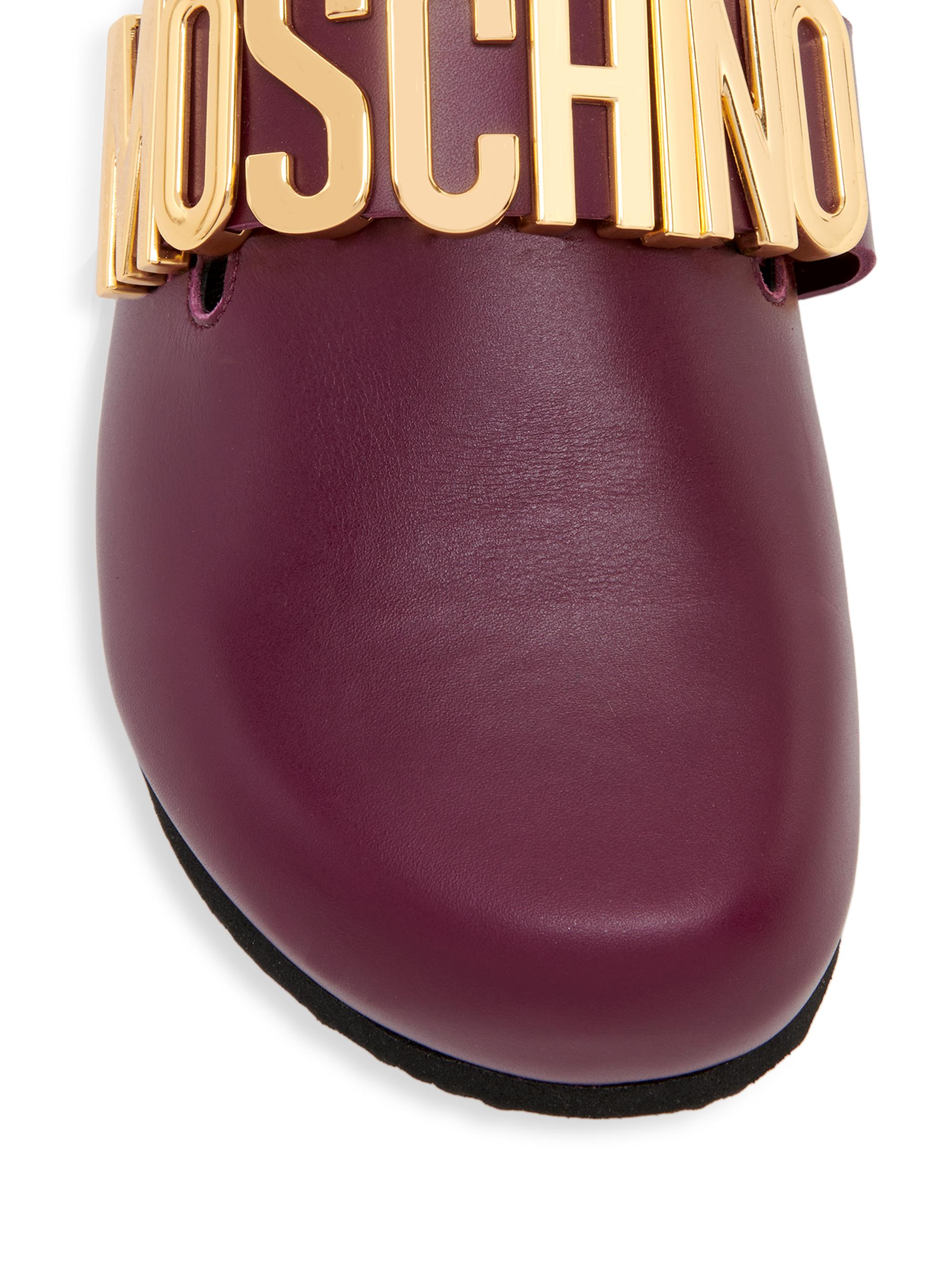 Shop Moschino Maxi Logo Leather Clogs | Saks Fifth Avenue