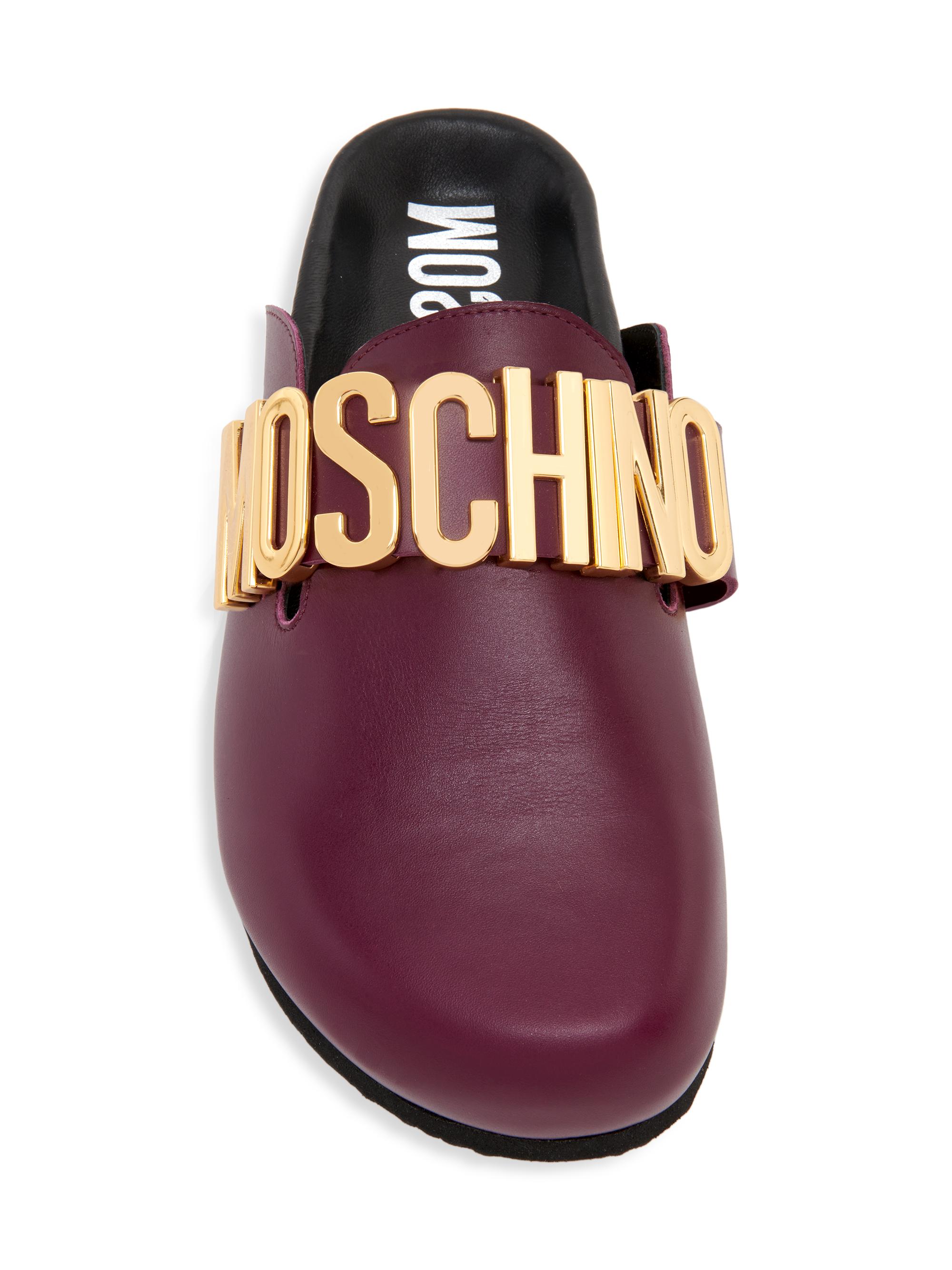 Shop Moschino Maxi Logo Leather Clogs | Saks Fifth Avenue