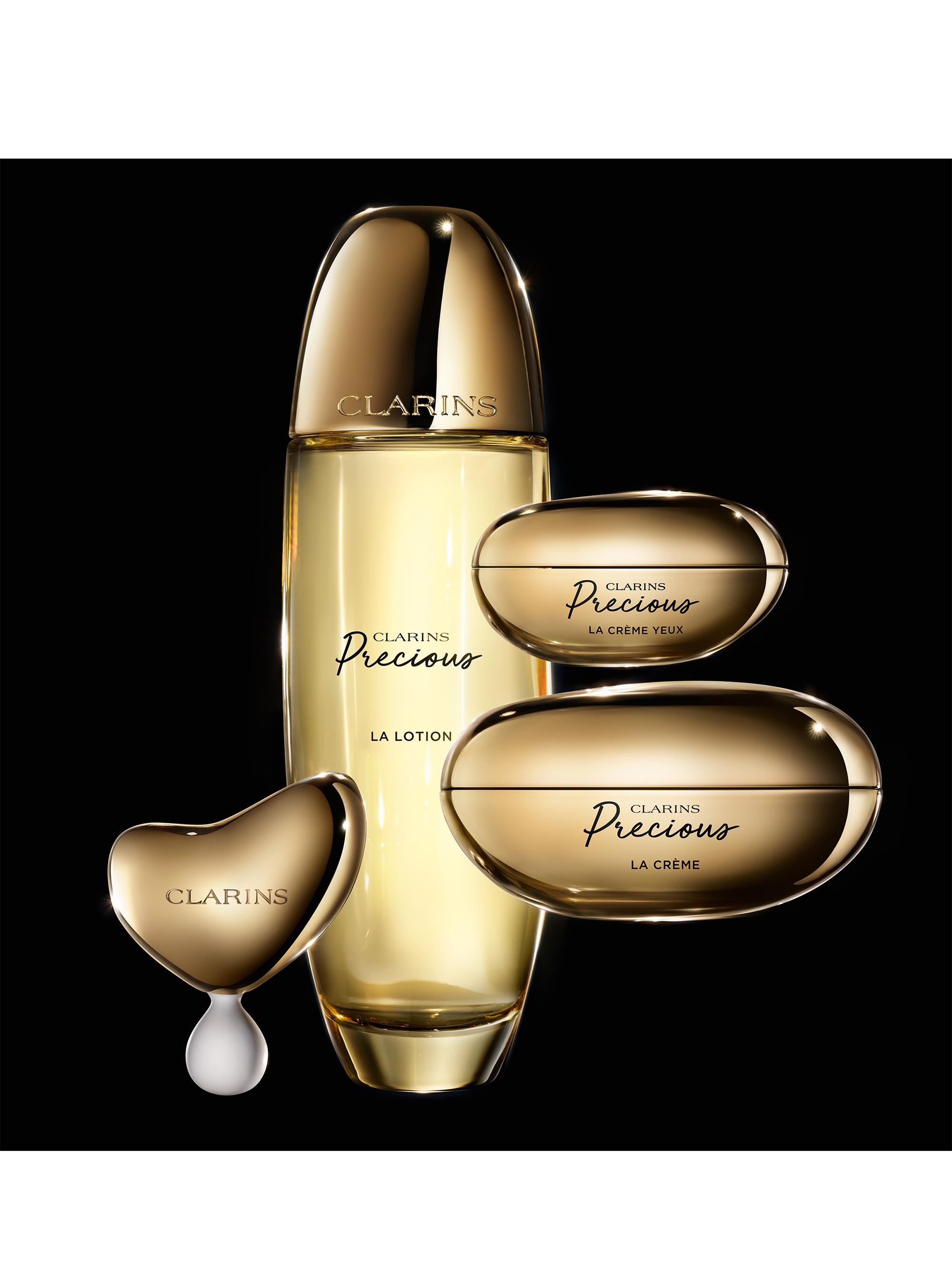 Shop Clarins Precious La Lotion Age-Defying Treatment Essence | Saks ...